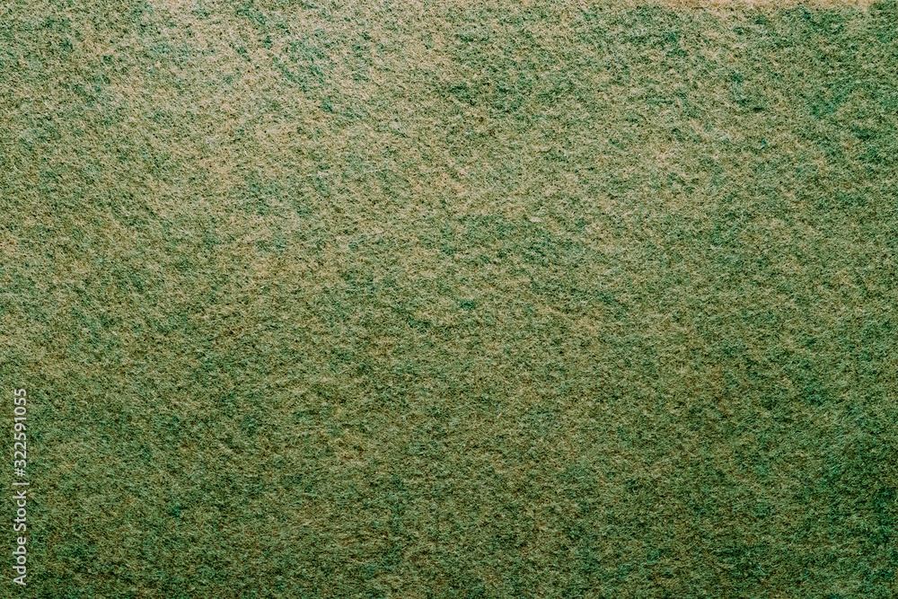 Dark green felt soft rough textile material background texture close up ...