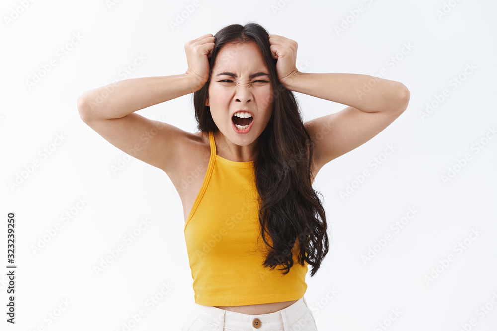 Hateful and outraged, pissed east-asian furious woman cursing someone ...