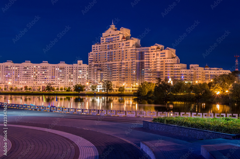 Island of Tears and House at Trinity Suburbs at night across Svislach ...