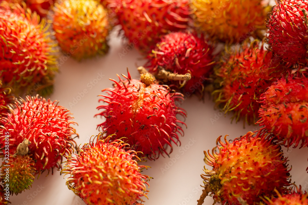 Rambutan, tropical Southeast Asian fruit Stock Photo | Adobe Stock