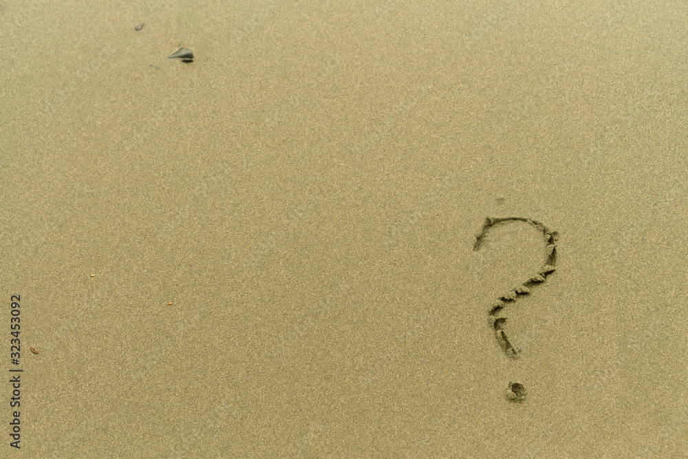 Question mark on sand Stock Photo | Adobe Stock
