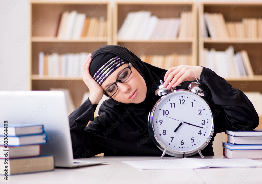 Muslim girl in hijab studying preparing for exams Stock Photo | Adobe Stock