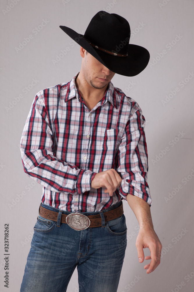 Thoughtful Cowboy looking serious Stock Photo | Adobe Stock