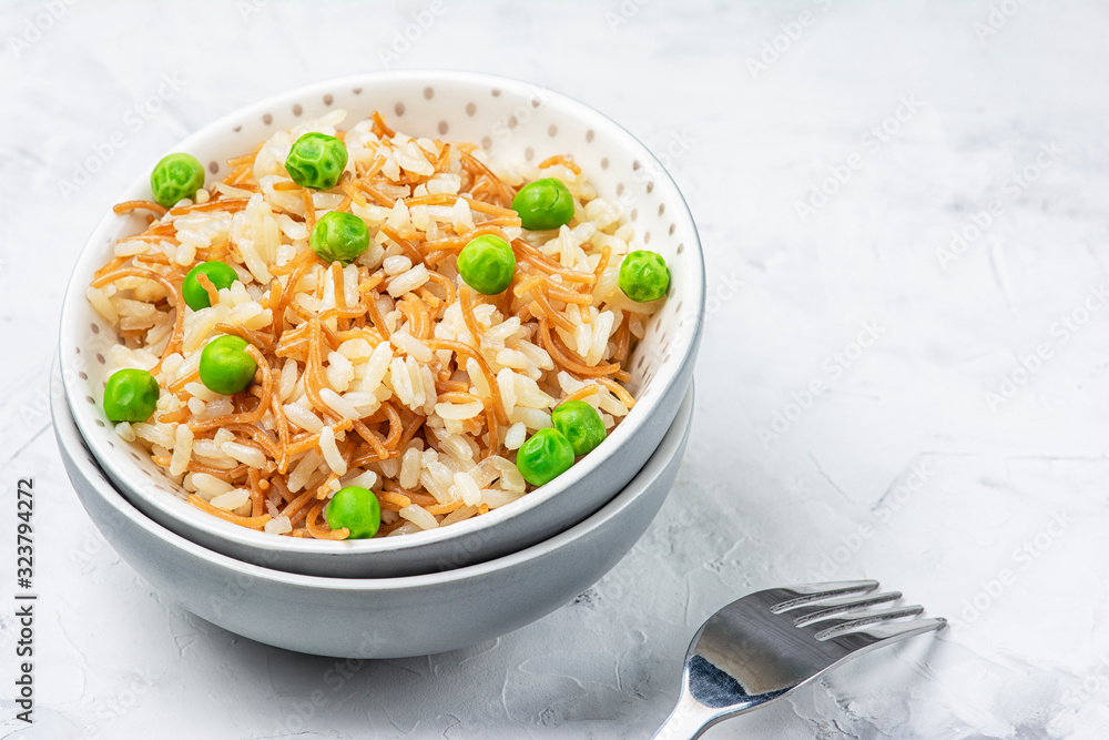 Turkish national side dish. A pilaf of rice and fried noodles decorated ...