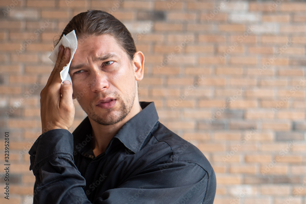 tired exhausted thirsty sweating man suffering from hot weather ...
