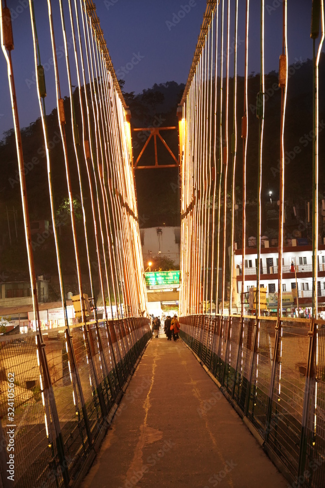 Ram Jhula This long famous pedestrian suspension bridge crossing the ...