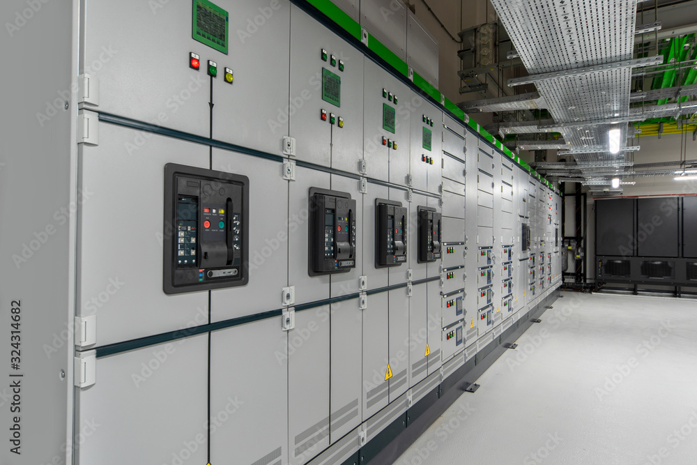 Low voltage switchboard. Electrical switch panel of switchgear room at ...
