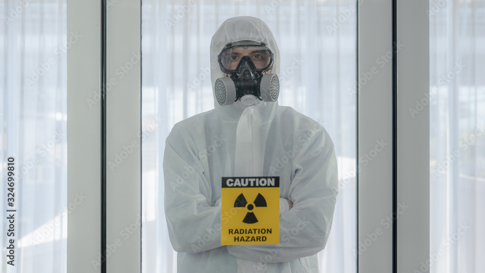 scientist with coverall protection clothing and full face protection ...