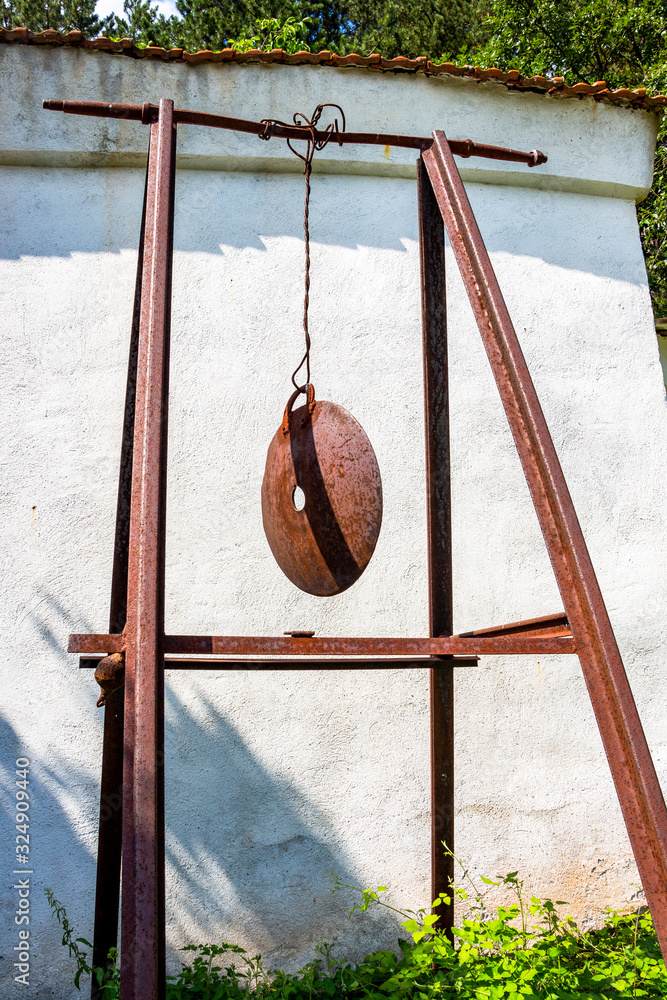 Old rusty metal semantron outside the Holy Trinity Church at the ...