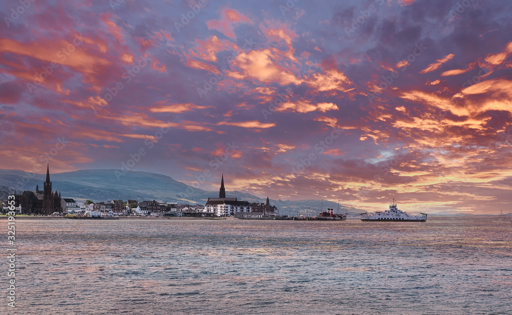 Car Ferry berthing at Largs Scotland. where the paddle Steamer Wavery an be seen berthed at the ...