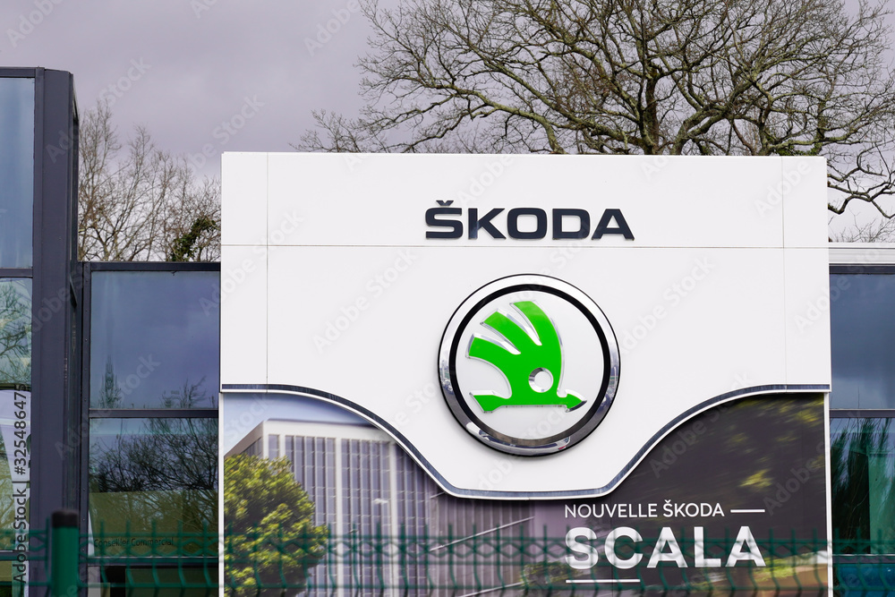 Skoda car dealership sign shop logo front of store showroom Czech ...