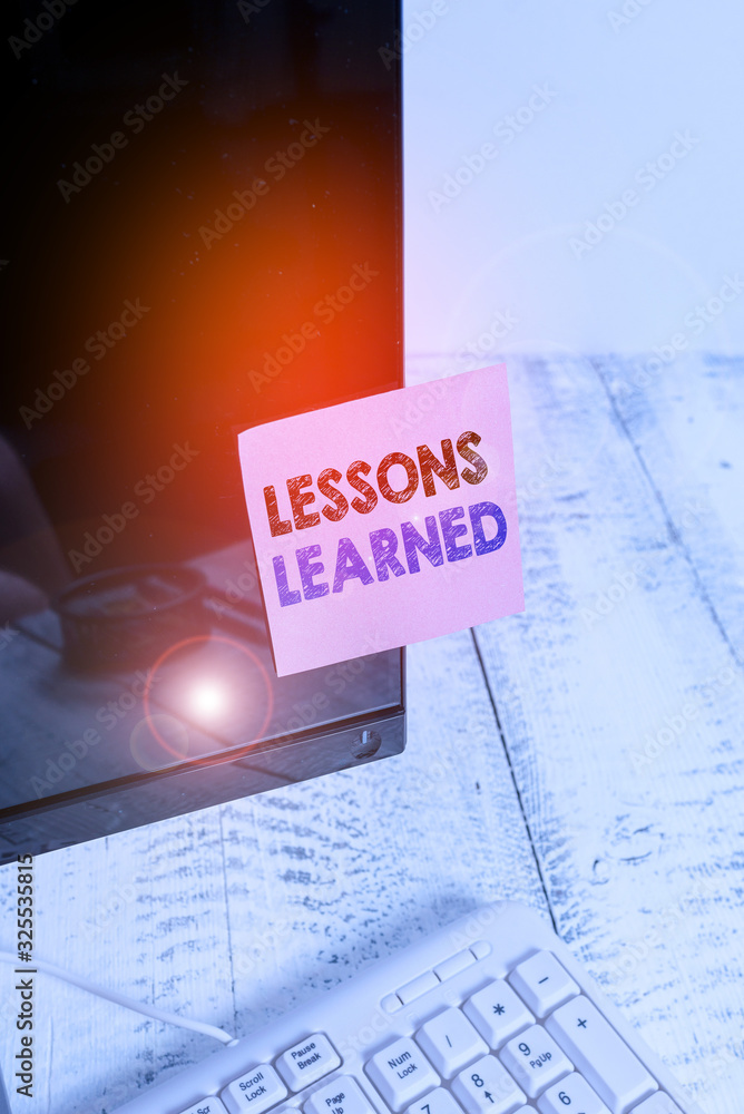 Conceptual hand writing showing Lessons Learned. Concept meaning the knowledge or understanding ...