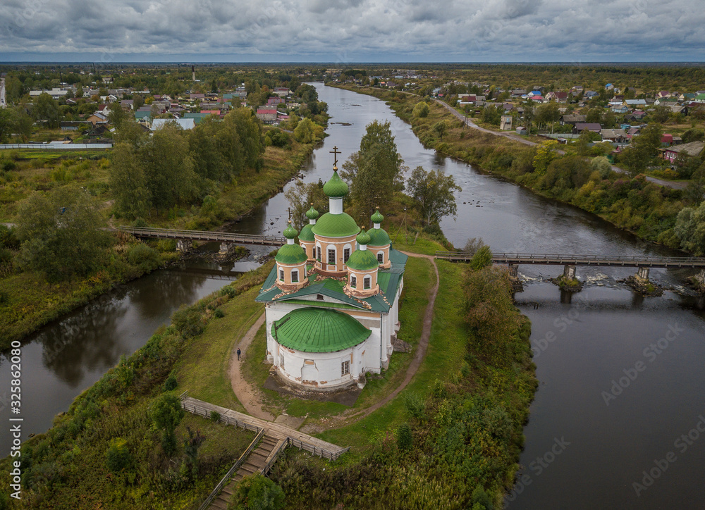 Aerial view of Smolensky Cathedral of Olonets located on a small island ...