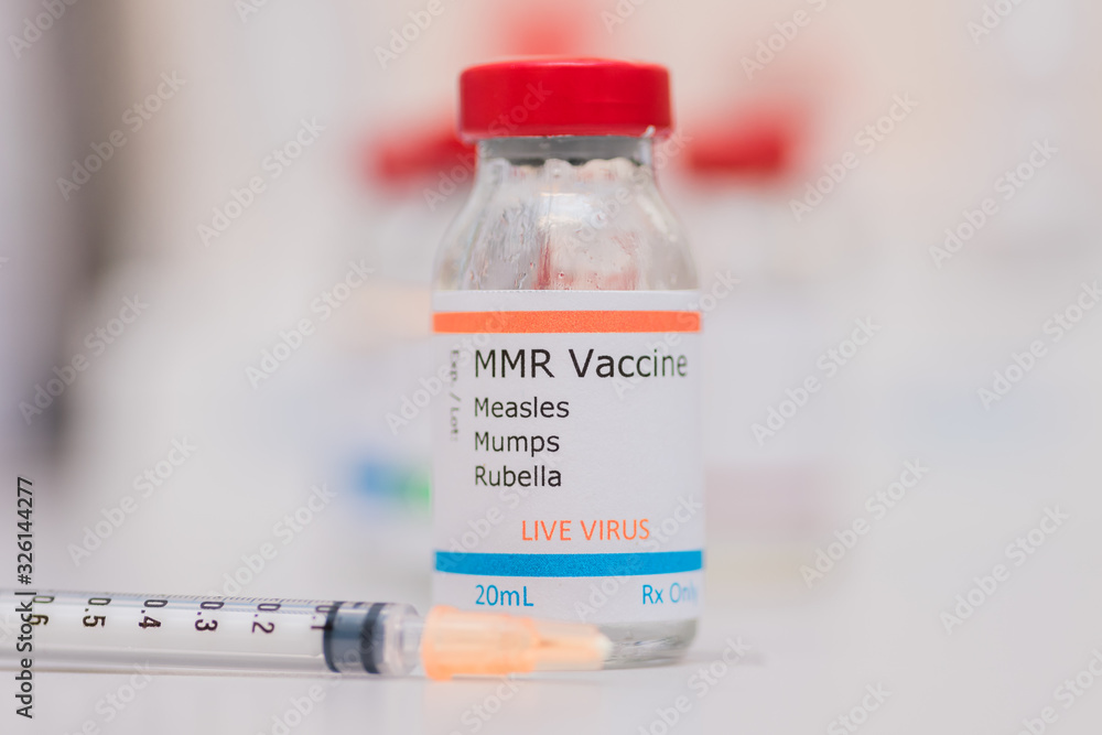 Measles, Mumps, and Rubella Vaccine Concept MMR Vaccination vial on ...