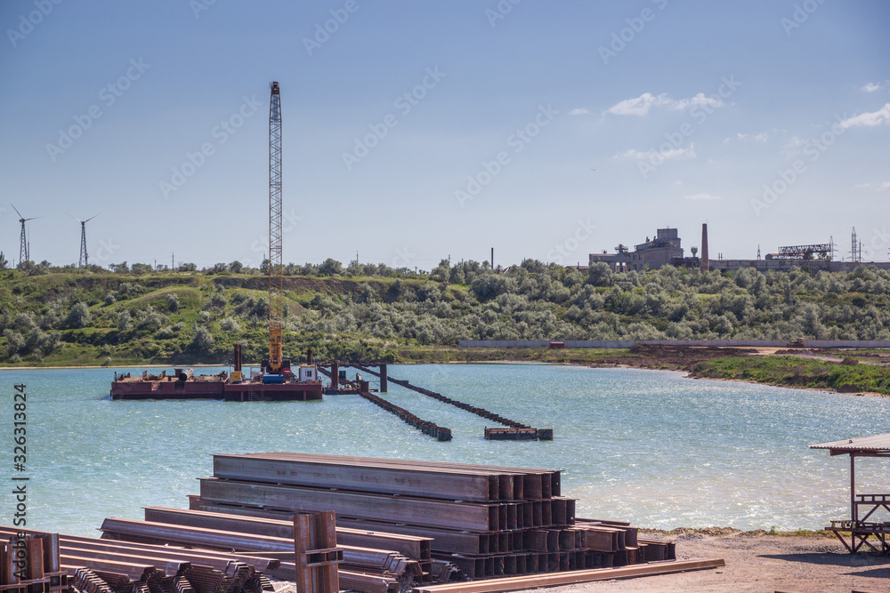 Construction of the berth from a metal sheet pile of the Larsen type ...