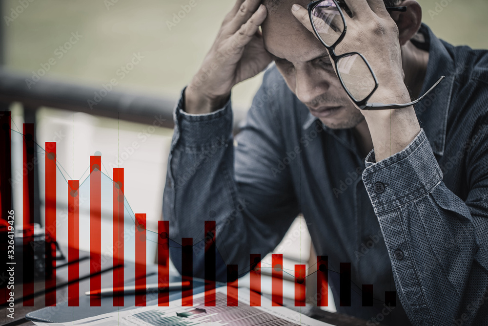 Businessman with chart in the fall. economy or stock market going down ...