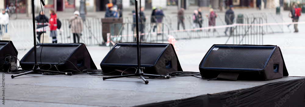 Stage monitor system, a row of stage floor monitors, three horizontal ...