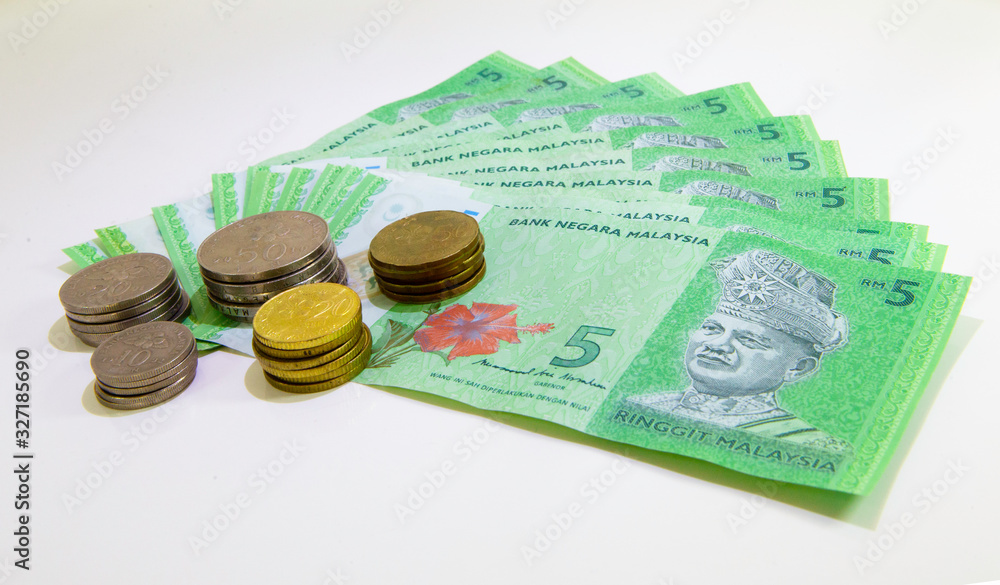 Malaysia Currency (MYR): Stack of Ringgit Malaysia bank note. There is ...