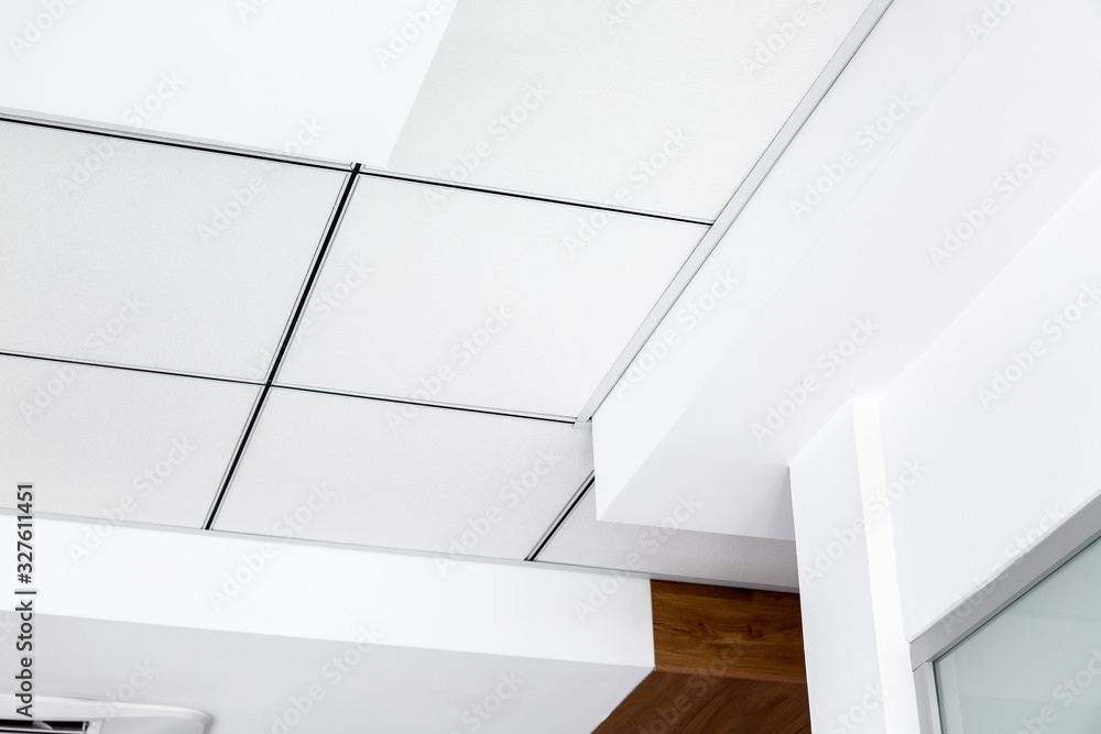 multi-level ceiling with three-dimensional protrusions and a suspended ...