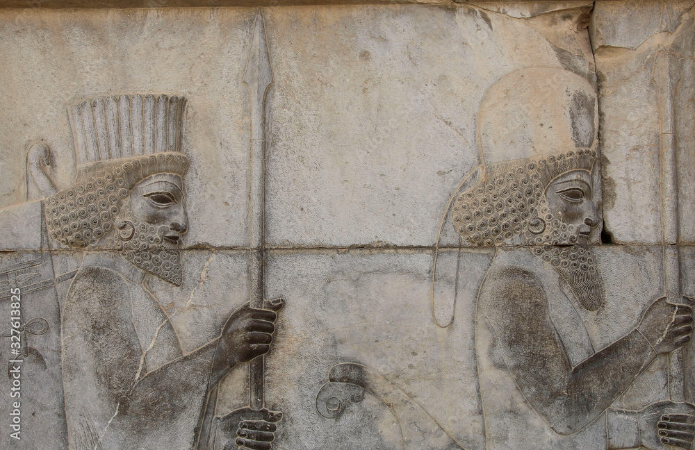 Bas-relief depicts guards - warriors of king. Ancient relief on the ...