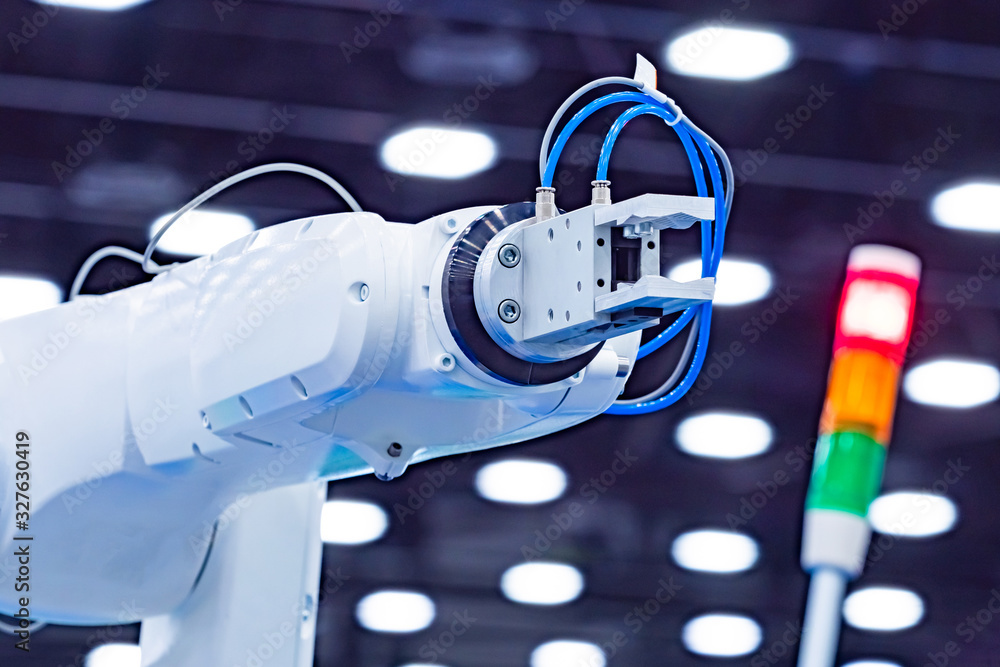 Hand is a manipulator. Industrial robotic arm. Using the robot in ...