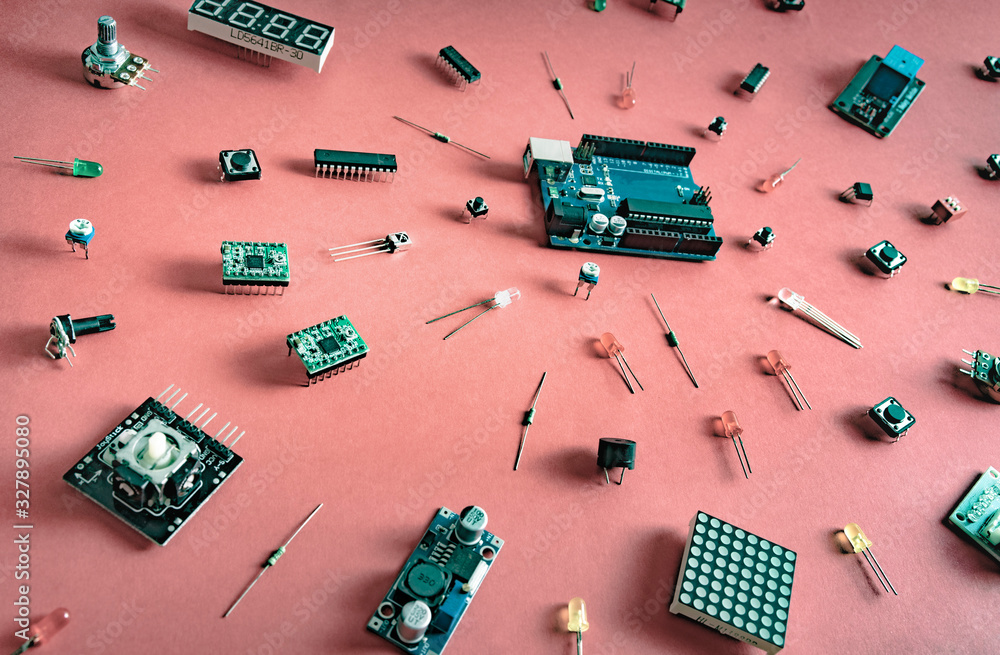 Micro electronics arduino DIY components on a light background, top ...
