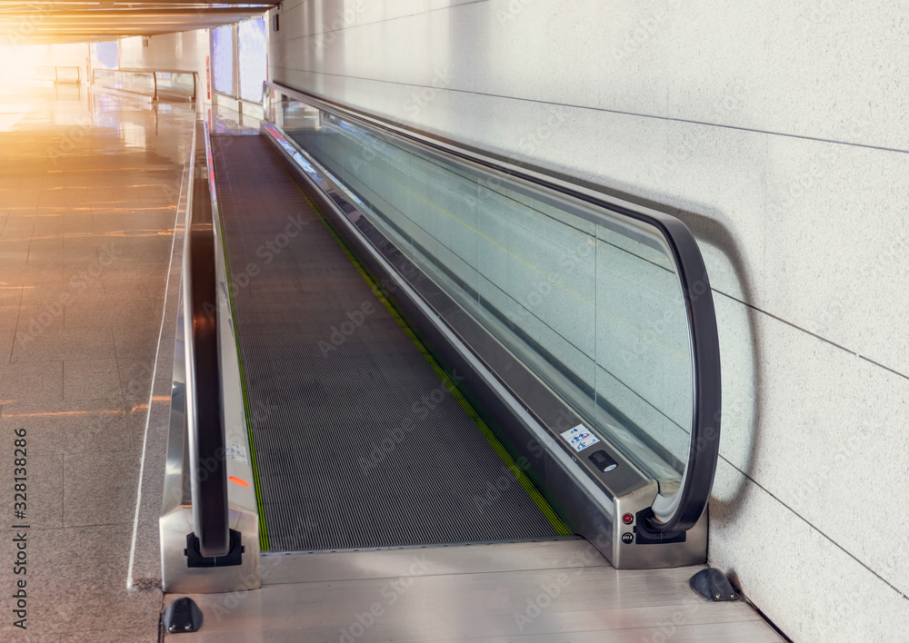 Stock-Foto „An empty travelator in the terminal of the airport terminal ...