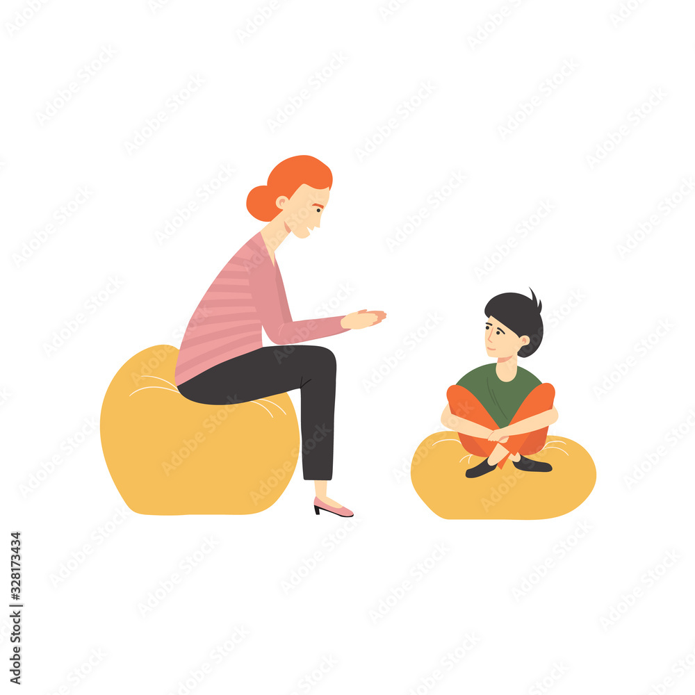 Child psychologist has conversation with boy. Family psychotherapy ...