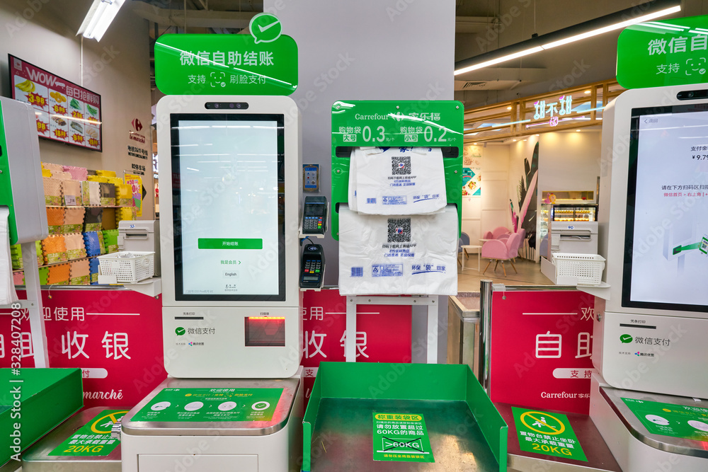 SHENZHEN, CHINA - CIRCA APRIL, 2019: self-service checkout at Carrefour ...