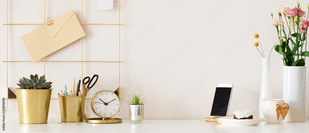 Stylish desk interior with White table background with plant and leaves ...
