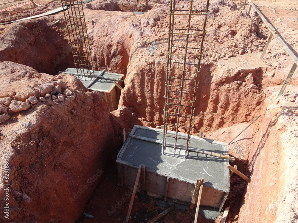 Pile cap and column stump under construction at the construction site ...