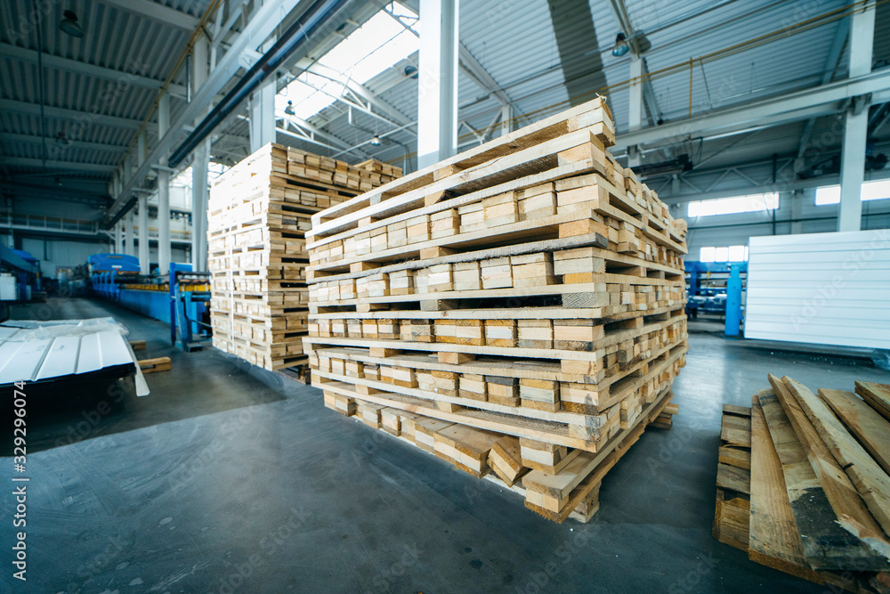 Wooden pallets on sandwich panel manufacturing Stock Photo | Adobe Stock