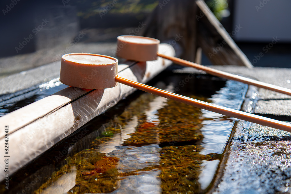 Water scoop at the approach to the shrine , Japanese water ablution ...