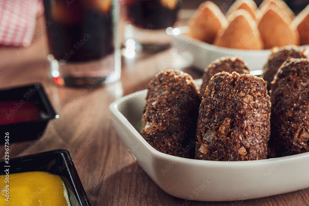 Brazilian appetiser kibbeh (Middle Eastern minced meat and bulghur ...