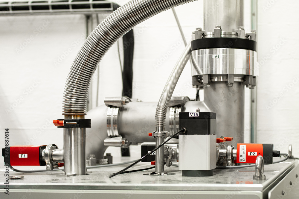 Science laboratory industrial size metal piping cables and digital ...