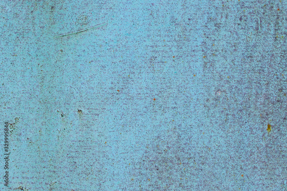 Wall with layer of paint. French Pass color, shade of blue. Spot rust ...