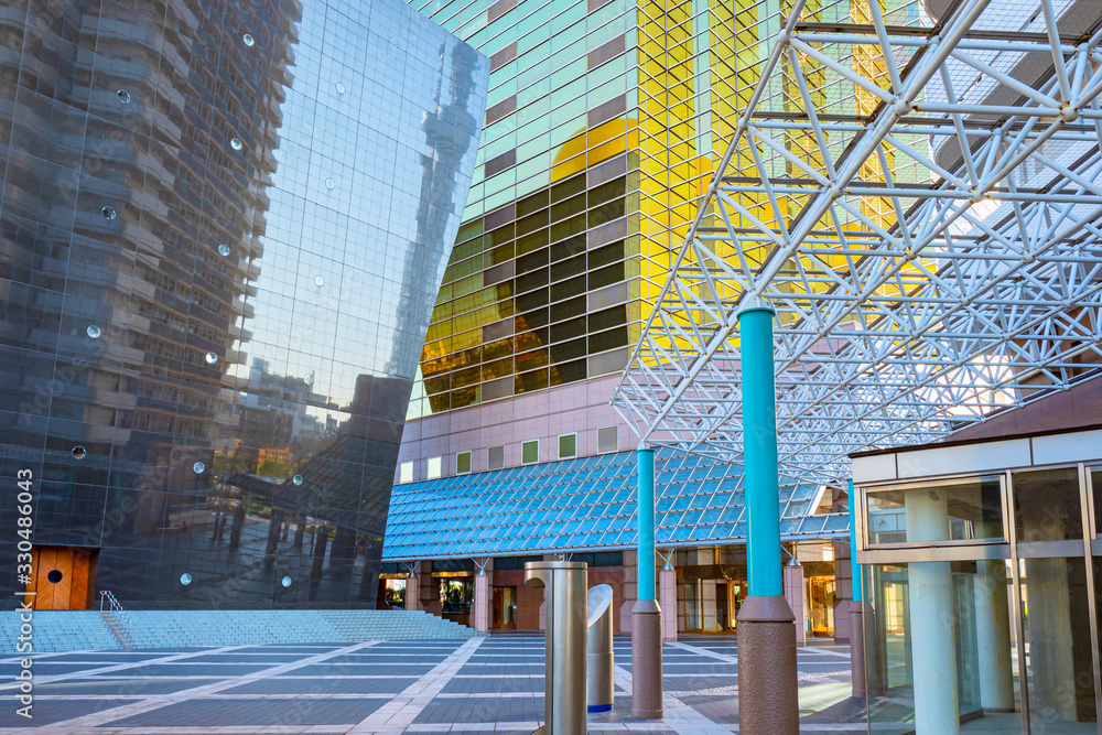 Japan. Tokyo. Glass skyscrapers close-up. Tokyo Television Tower is ...