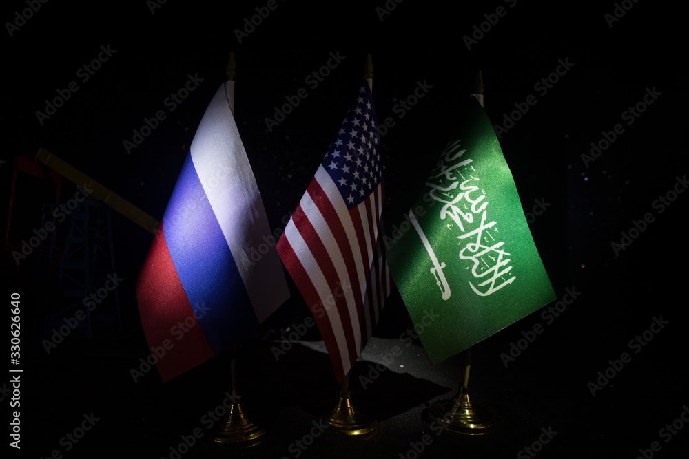 Business dialogue, oil agreement concept: National flags with Oil pump ...