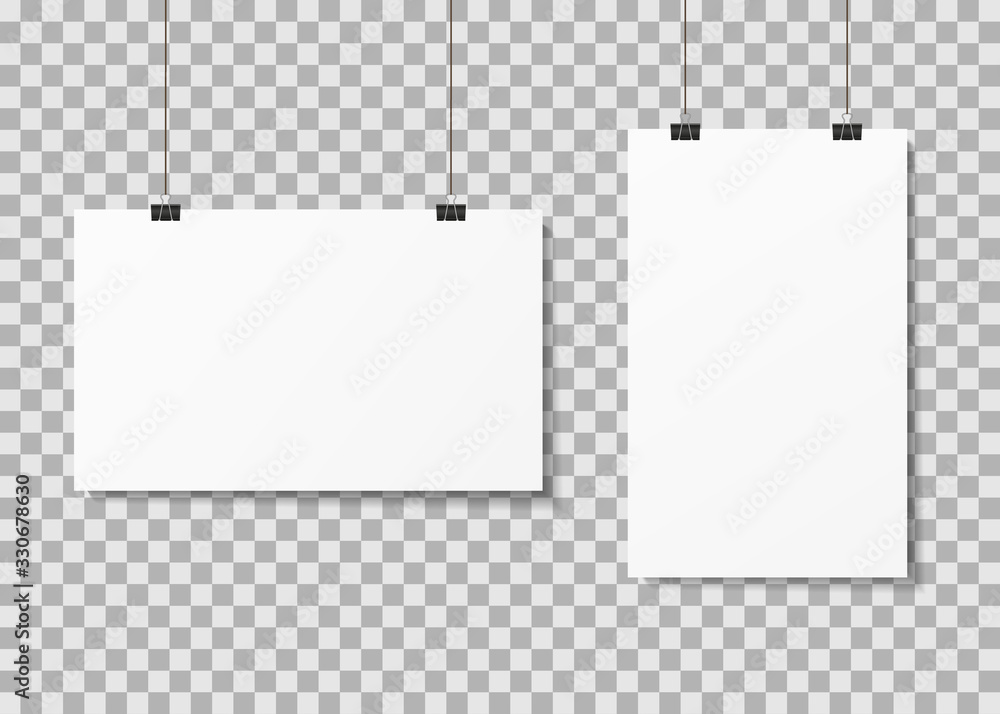 White paper posters hanging on binder clips with shadows. Mock up empty ...