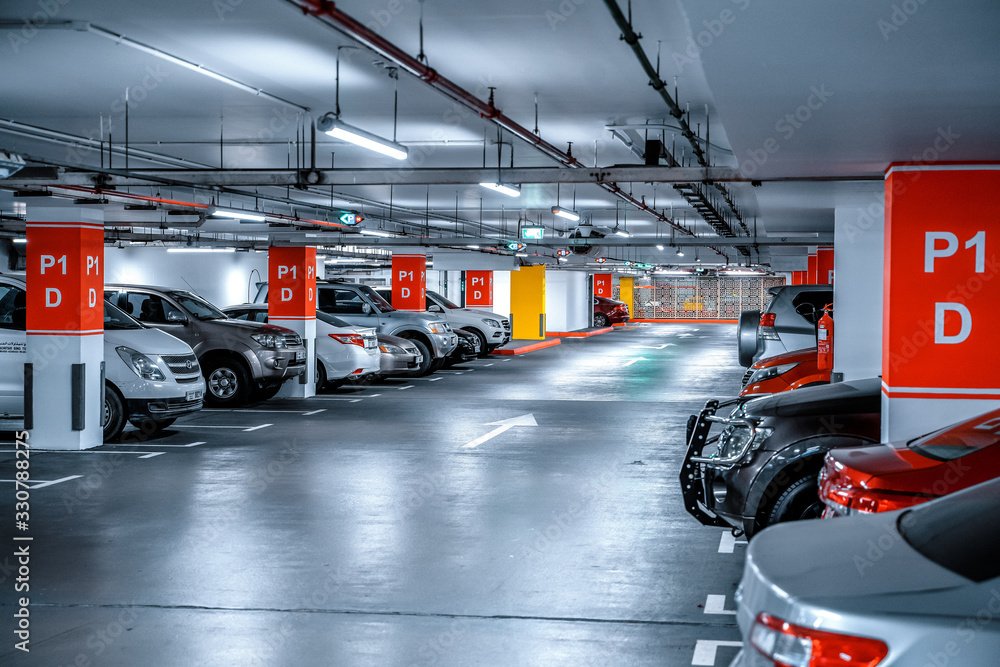 Parking garage - interior shot of multi-story car park, underground ...