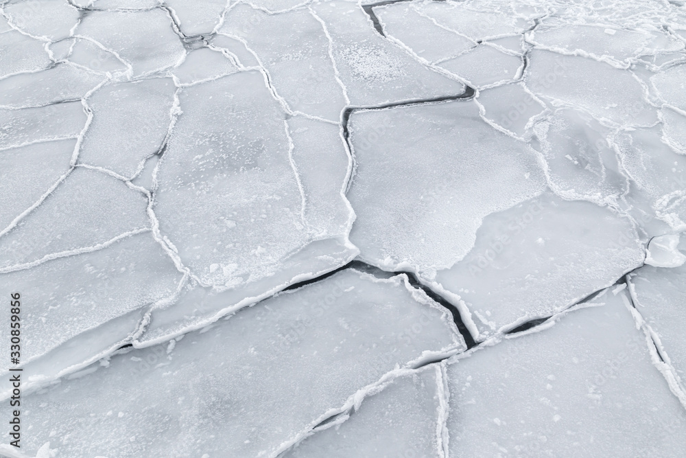 Cracked pieces of sea ice floating in Greenland, showing natural ...
