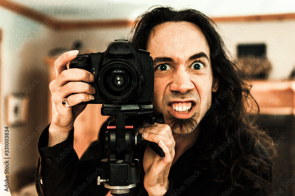 Foto de Stock A close up front portrait of a caucasian photographer ...
