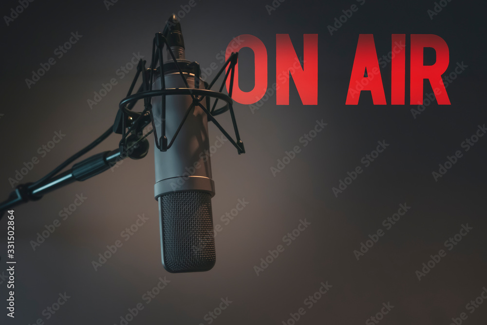 Professional microphone in radio station studio on air Stock Photo ...