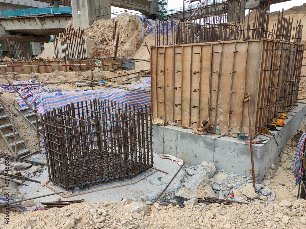 Pile cap and column stump under construction at the construction site ...