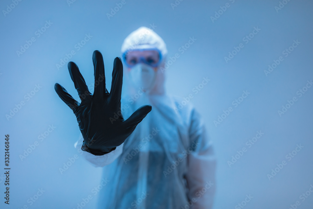 Medical doctor, scientist in full body suit for prevention from viruses ...