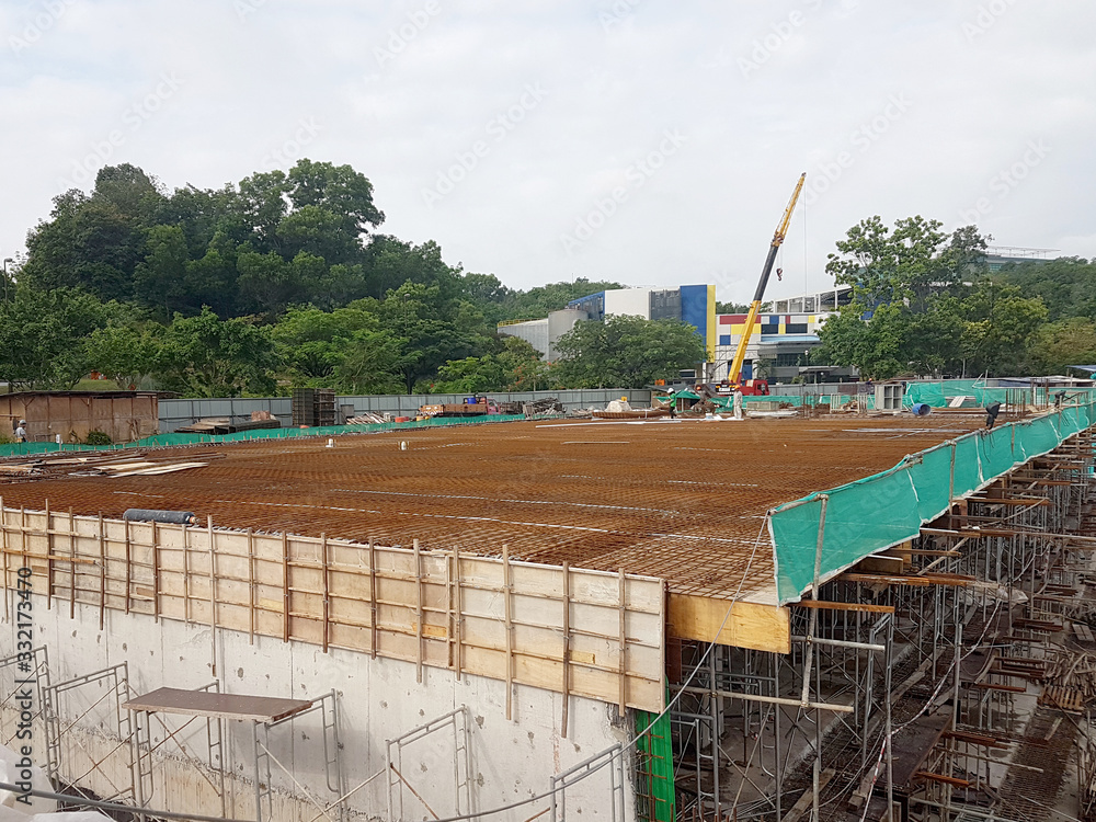 Building floor slab under construction. Construction workers ...