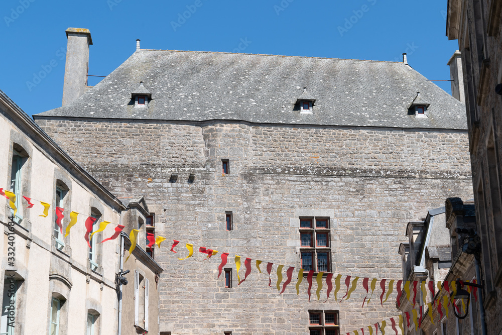 yellow red pennants on house street in Loire Atlantic region Guerande ...