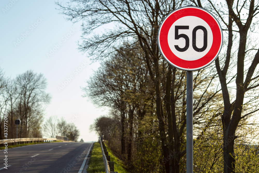german speed limit sign 50 kmh at a country road Stock Photo | Adobe Stock