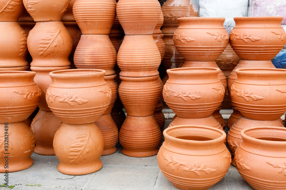 many stacked ceramic pots of different shapes and sizes Stock Photo ...