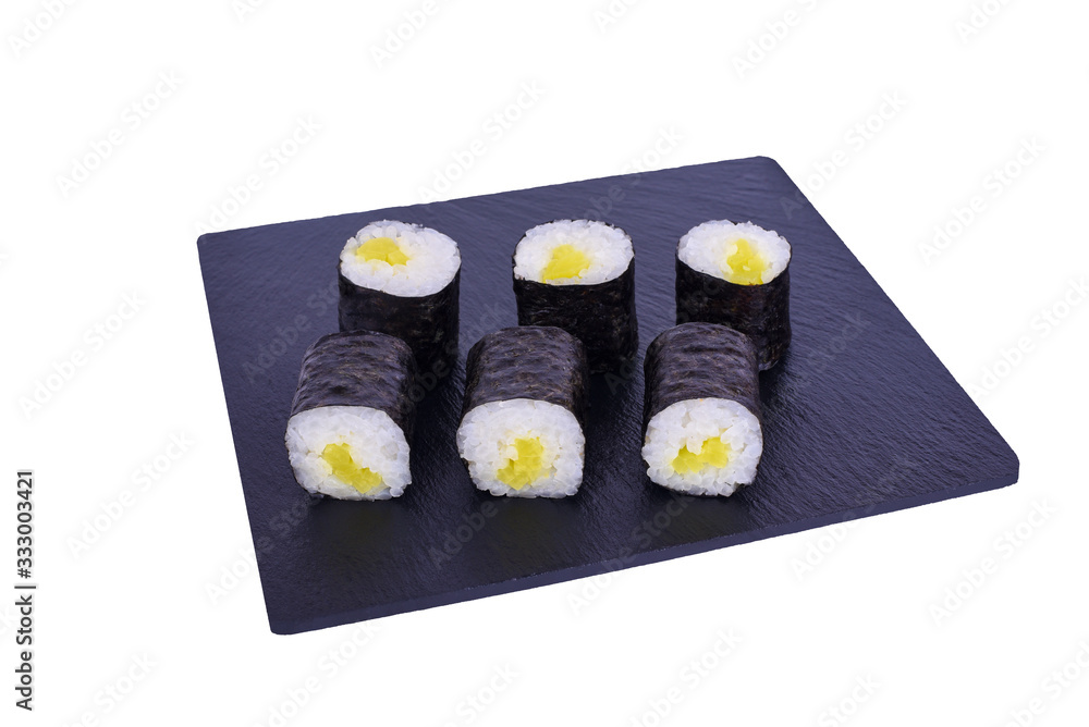 Traditional fresh japanese sushi maki on black stone Maki Daikon on a ...
